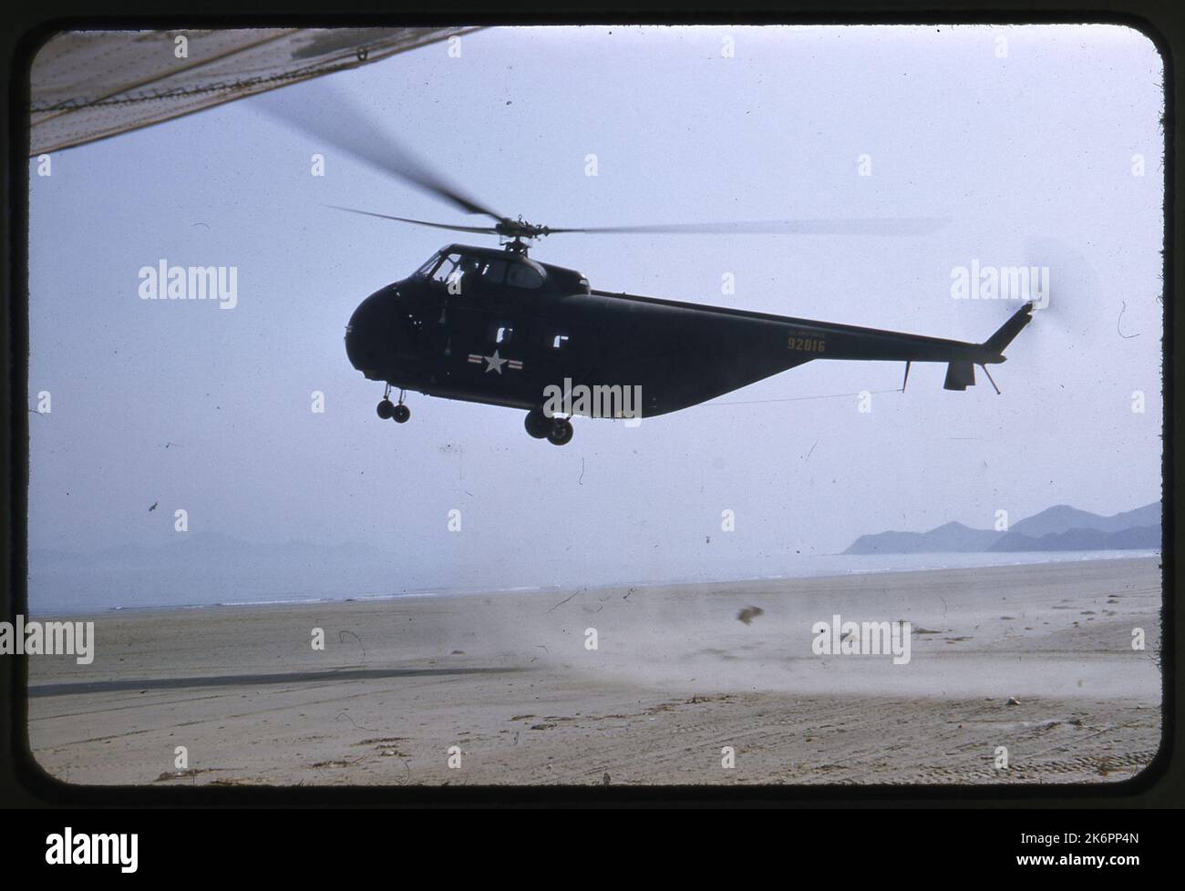 Left side view of a Sikorsky H-19 Chickasaw (s/n 49-2016) hovering ...