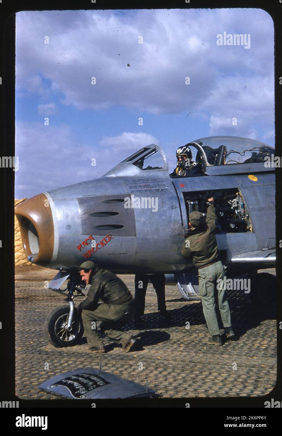 Left side view of the front of a North American F-86E Sabre, "Mach ...