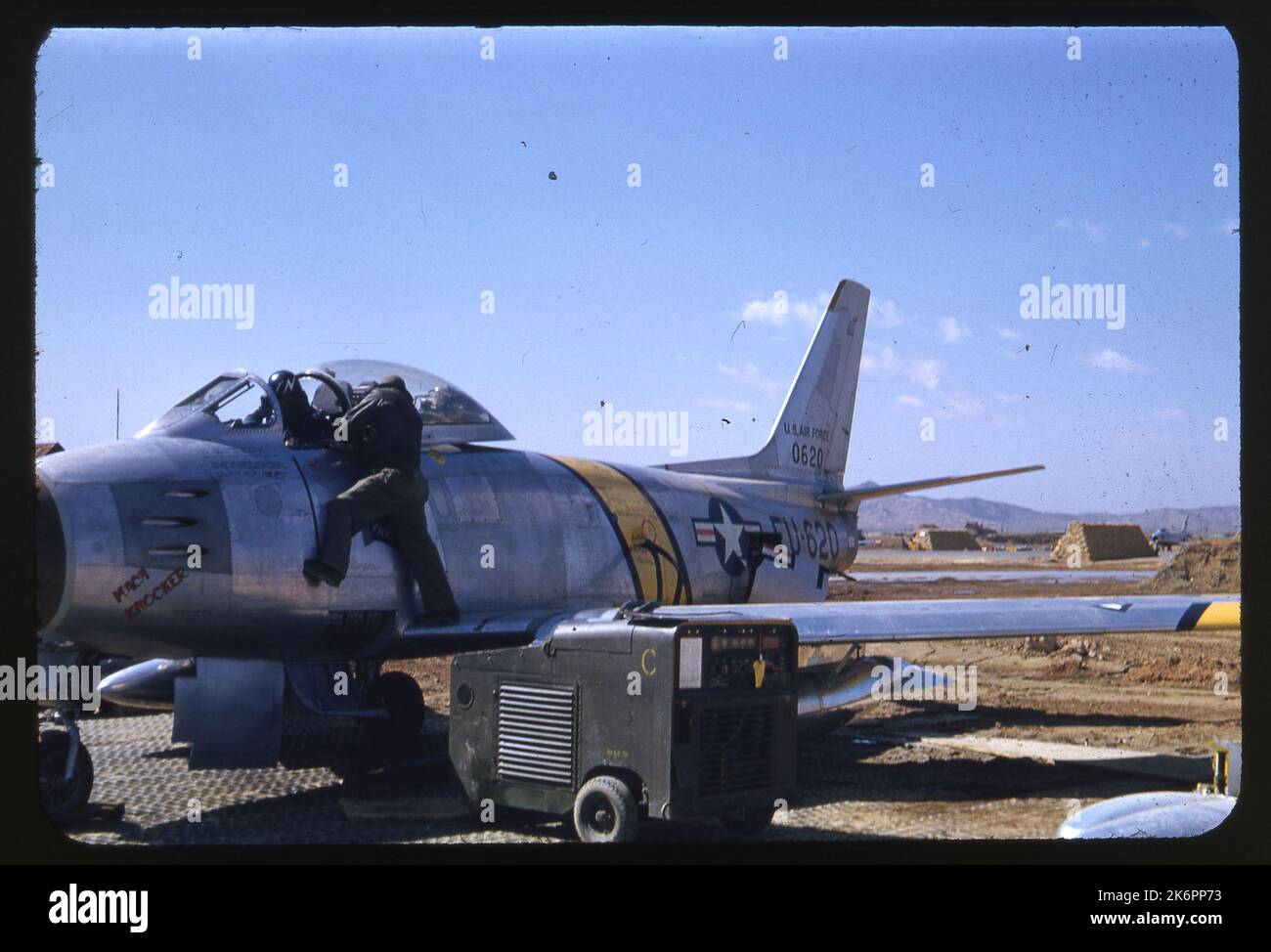 Three-quarter left front view of a North American F-86E Sabre, "Mach ...
