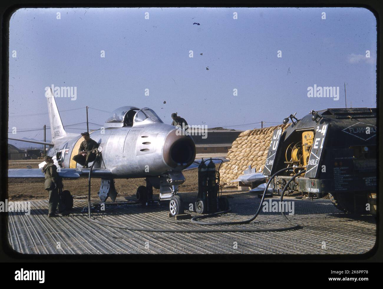 Three-quarter right front view of a North American F-86E Sabre (s/n 50 ...