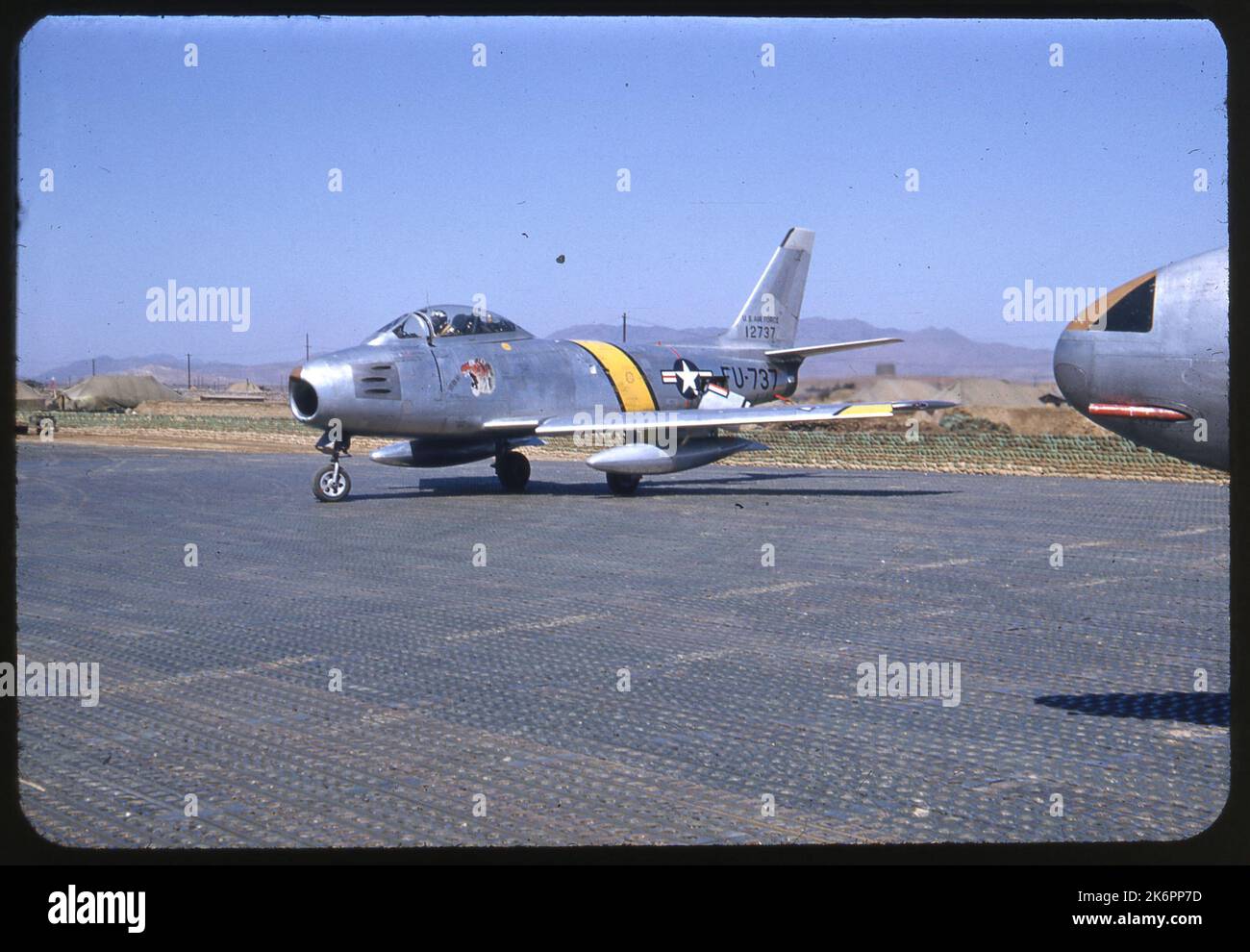 3/4 left front view of a North American F-86E Sabre jet (s/n 51-2737; c ...