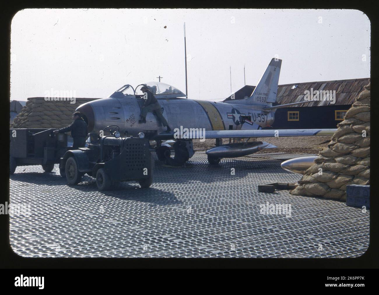 Three-quarter left front view of a North American F-86E Sabre jet "Mach ...