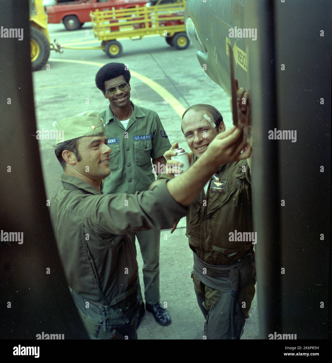 Lieutenant Commander Michael J. Ettel, Captain Larry Richards, and ...