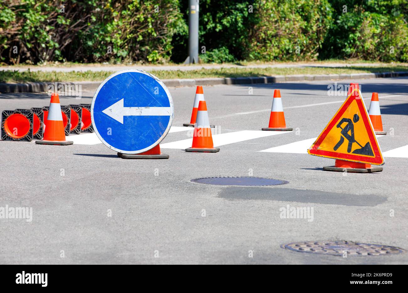 Fresh markings at the pedestrian crossing are fenced with traffic ...