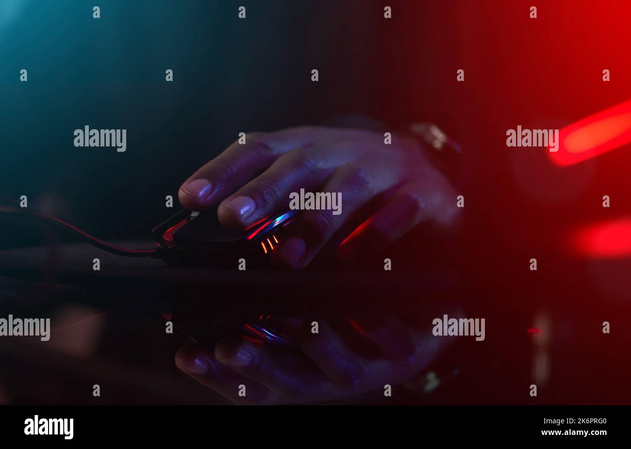 Working on his aim. an unrecognizable male gamer playing video games in ...