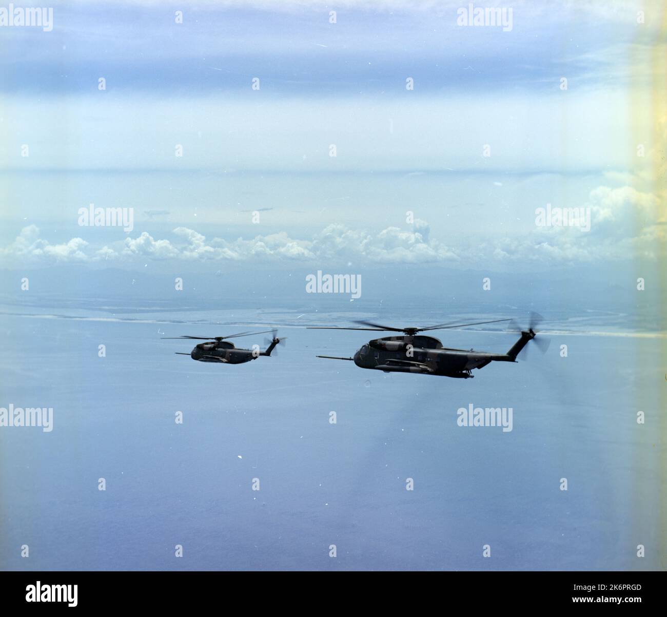 Rear View of HH-53 Approaching an HC-130P for Aerial Refueling. Rear ...