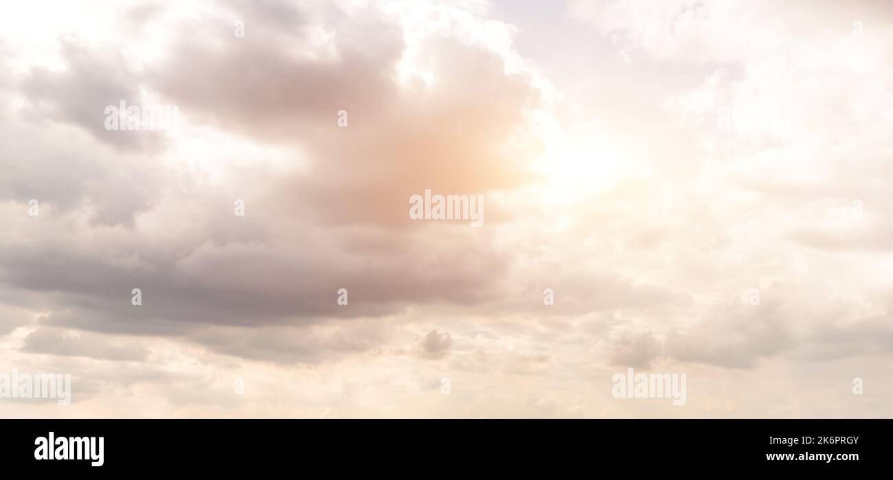 Beautiful sky background. Clouds block the sunlight and shine through ...