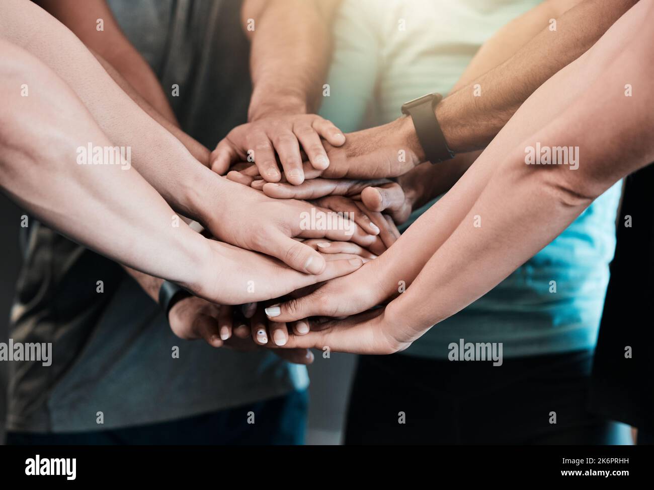 Motivate your team to do their best. a group of friends with their ...