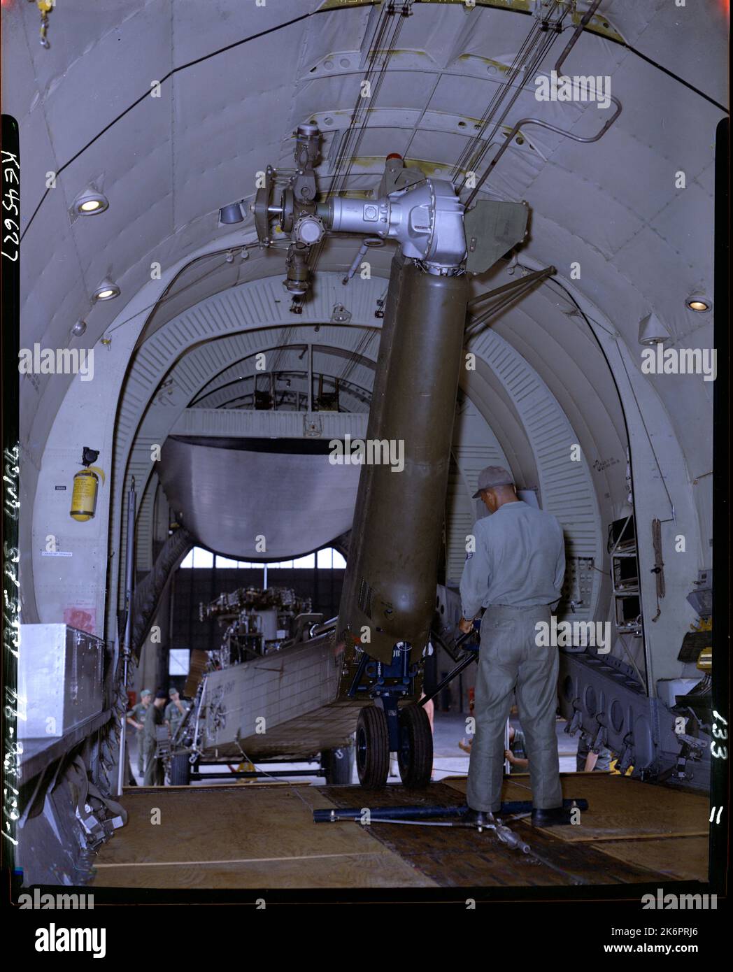 Air Force Personnel Load a Helicopter on to a C-133. Air Force ...