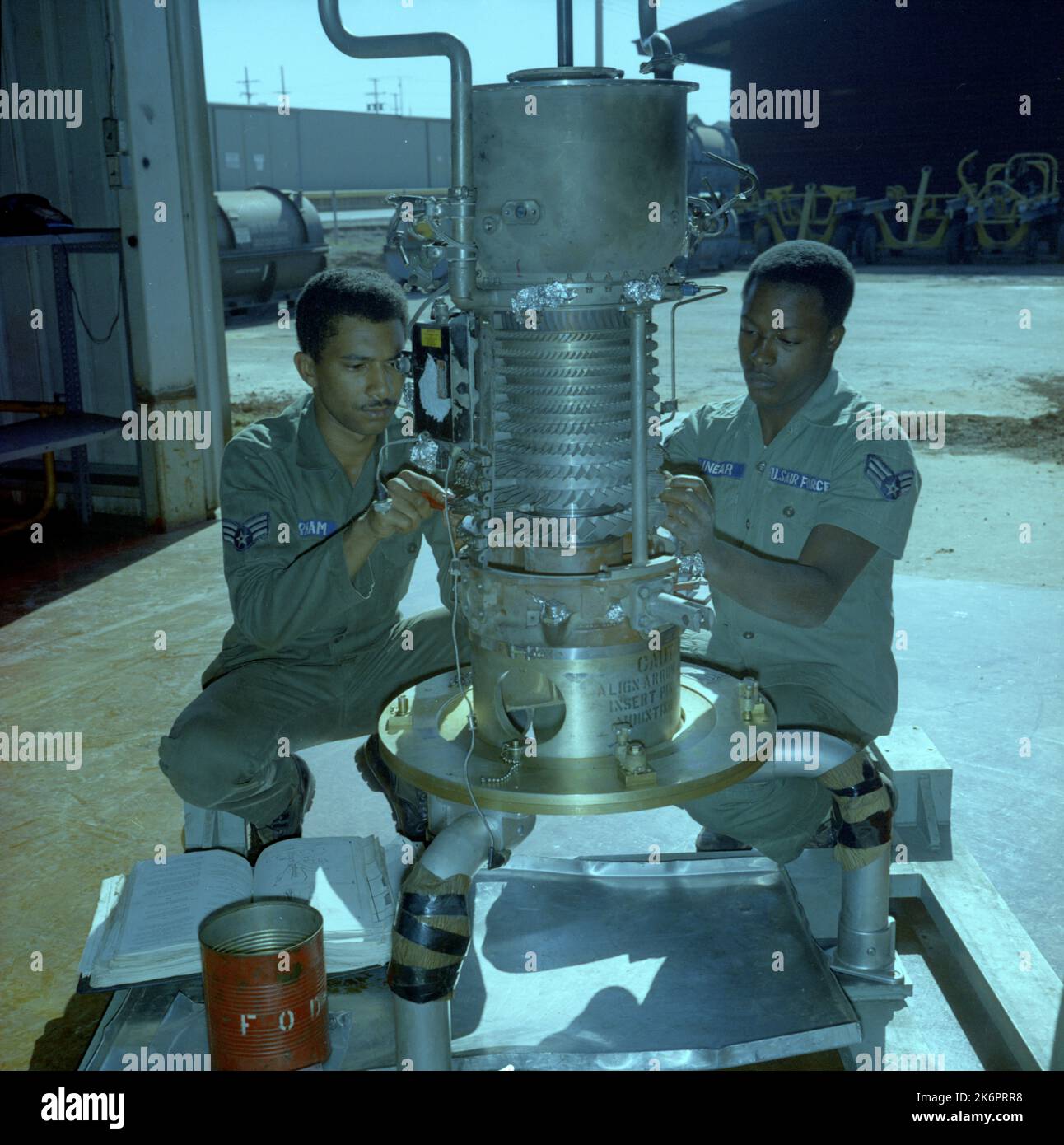 Sergeant Doyle Parham and Delbert P. Linear Cleaning and Inspecting the ...