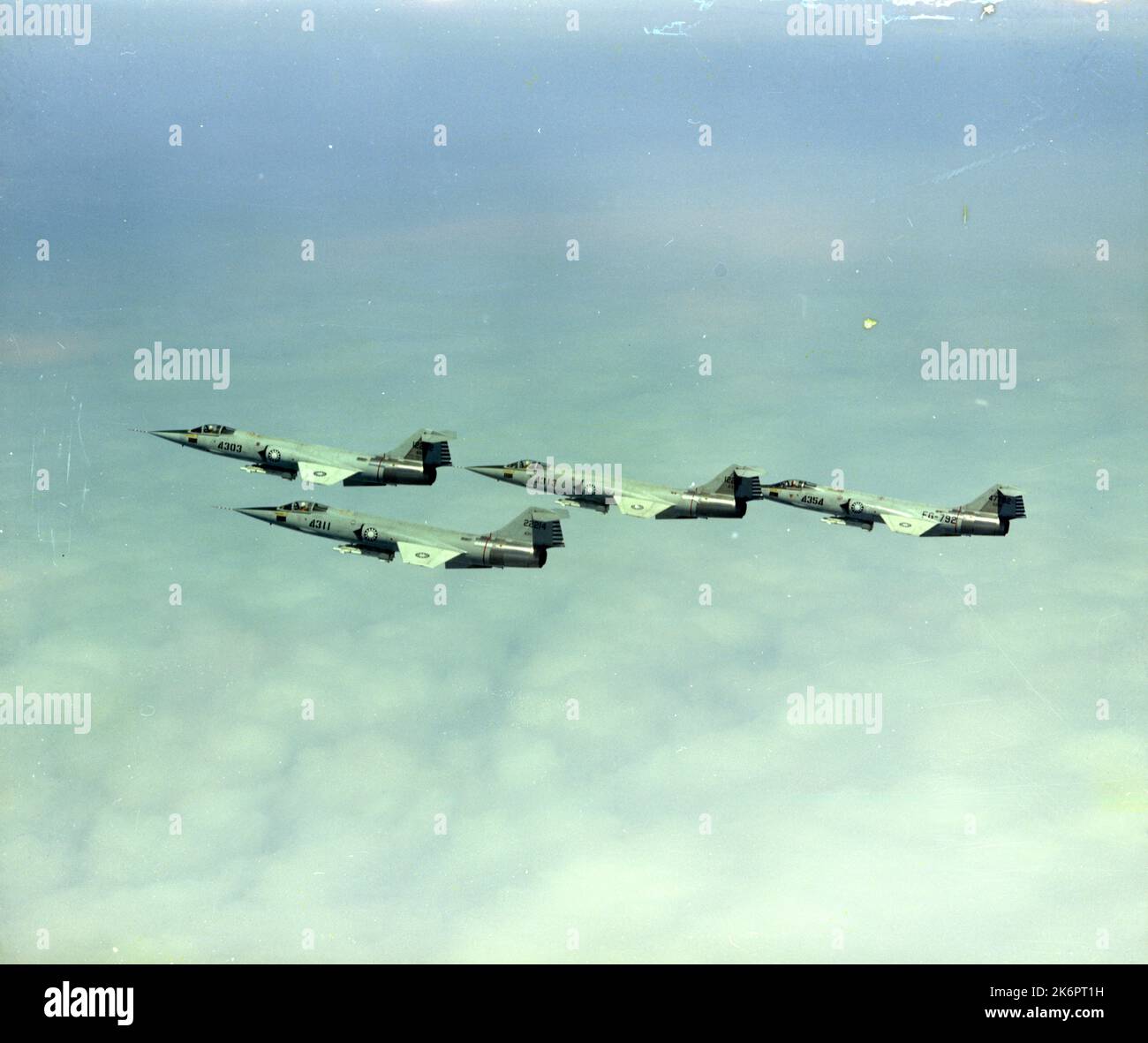 Side View of Four Chinese Nationalist Air Force F-104 Aircraft Flying ...