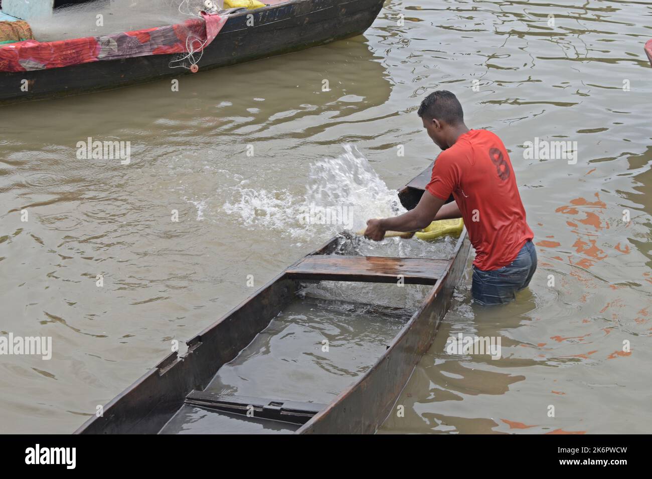 Man working to restore his boat hi-res stock photography and images - Alamy
