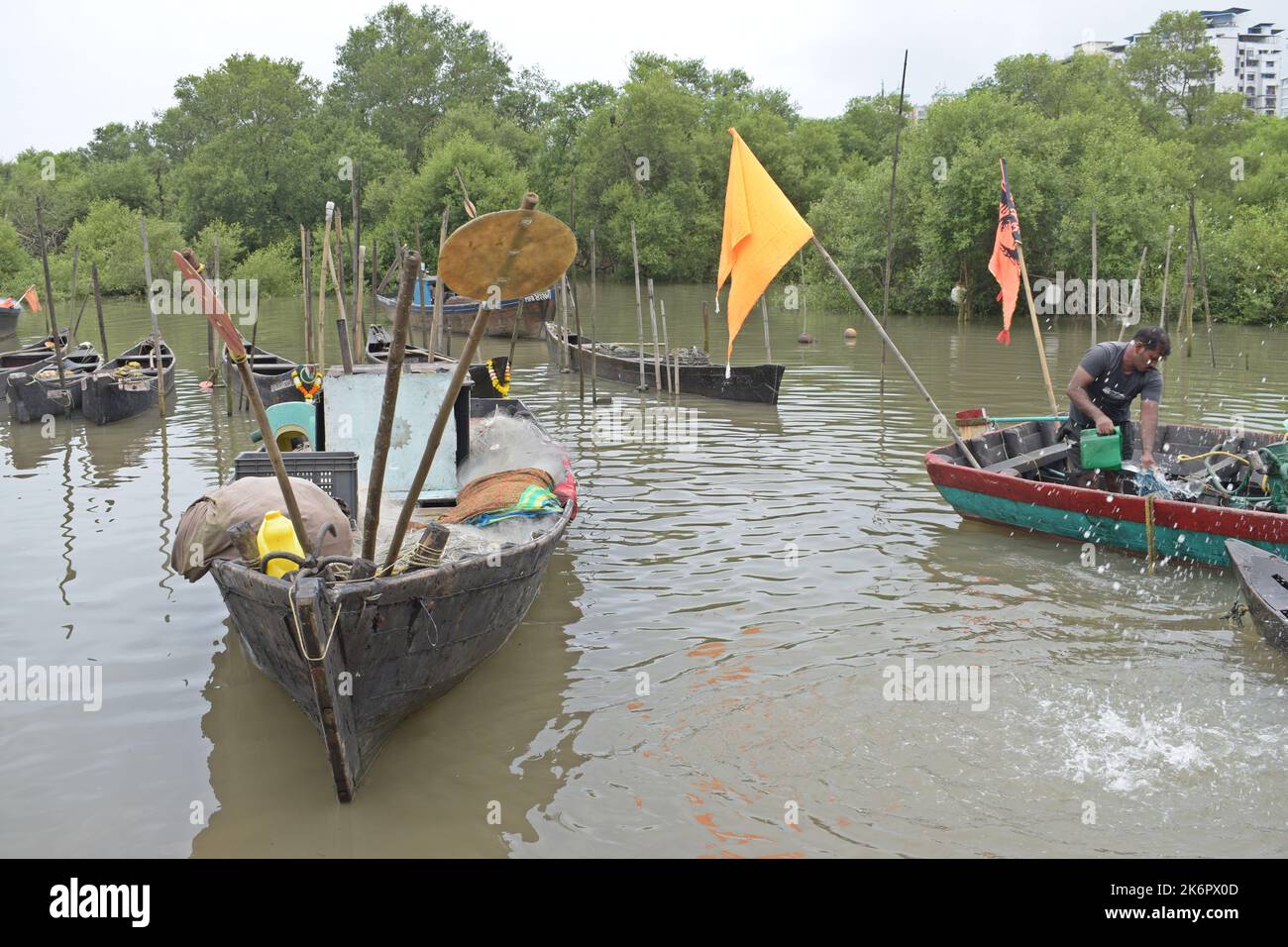 fisherman working on boat Stock Photo - Alamy