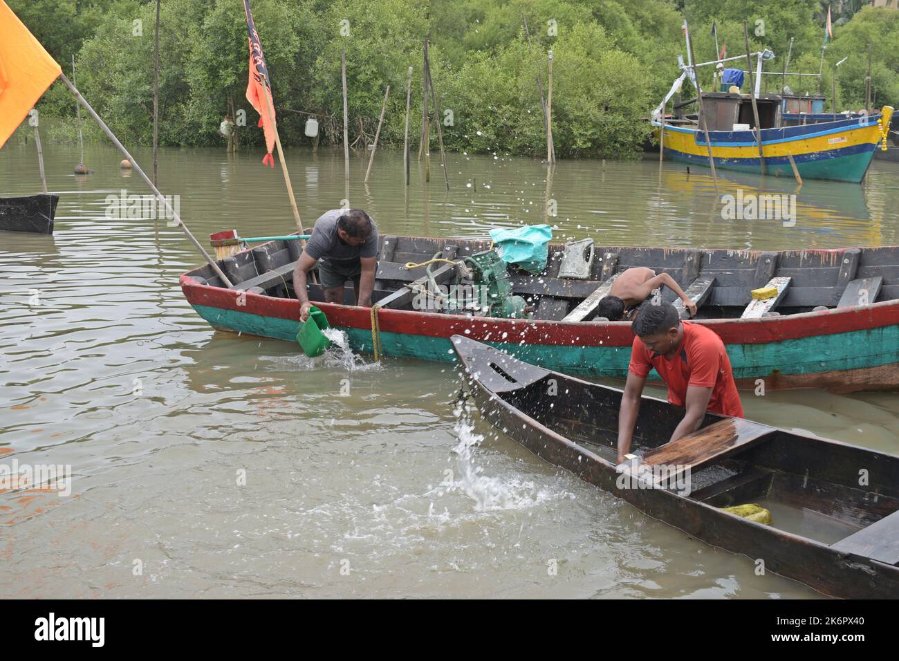 Man working to restore his boat hi-res stock photography and images - Alamy