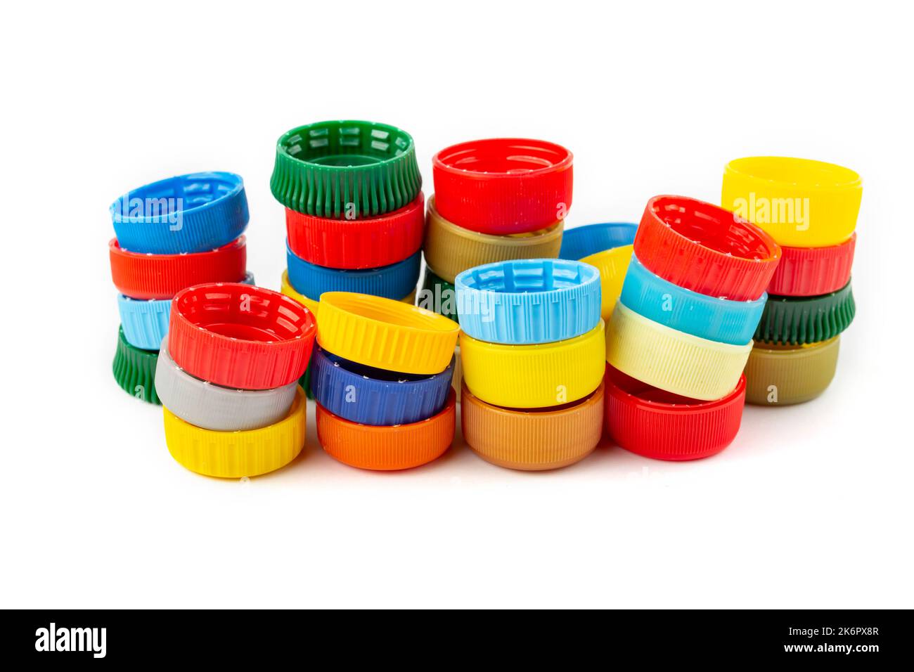 Сolorful plastic caps on white background, recycle for environment ...
