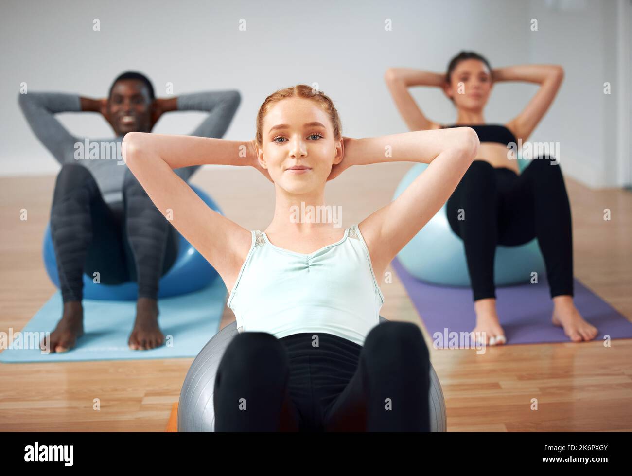 Never prouder of my progress. a group of students performing crunches ...