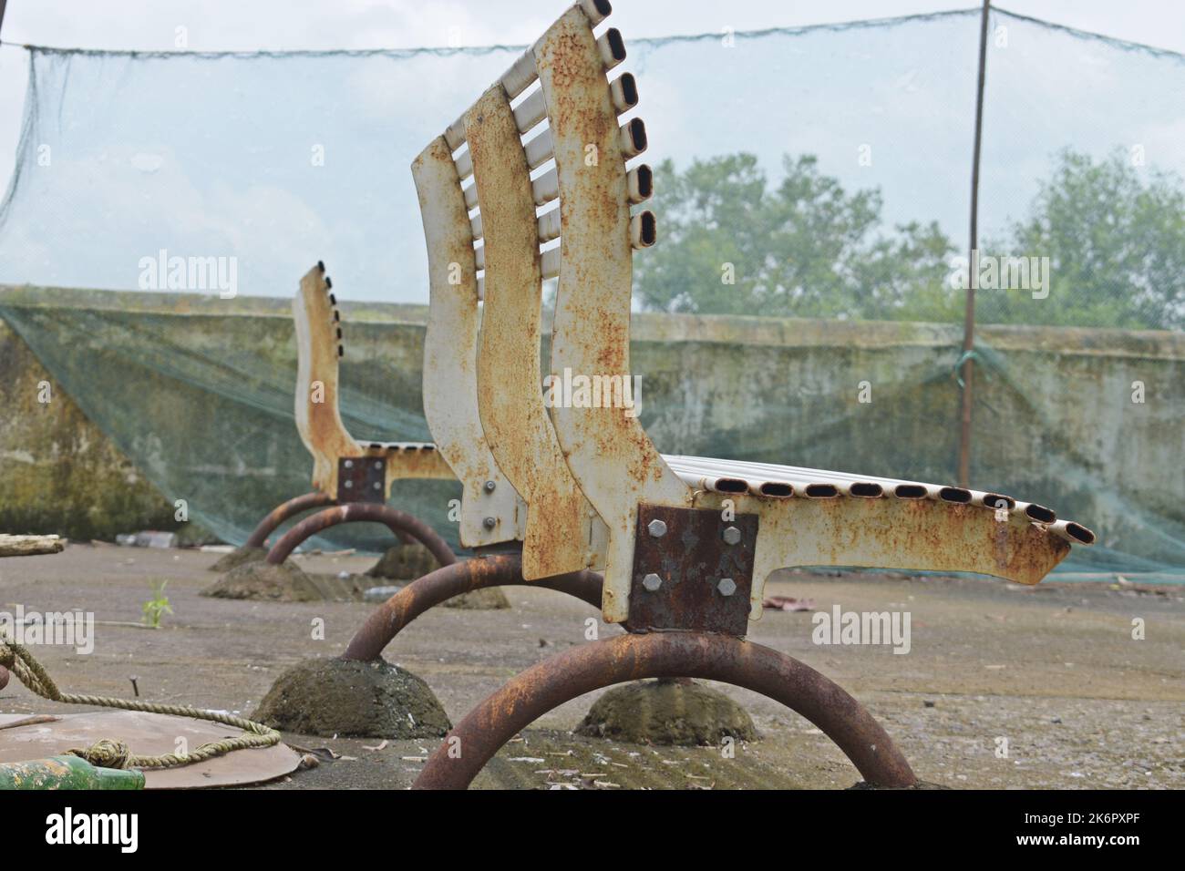 old rusty outdoor benches Stock Photo - Alamy