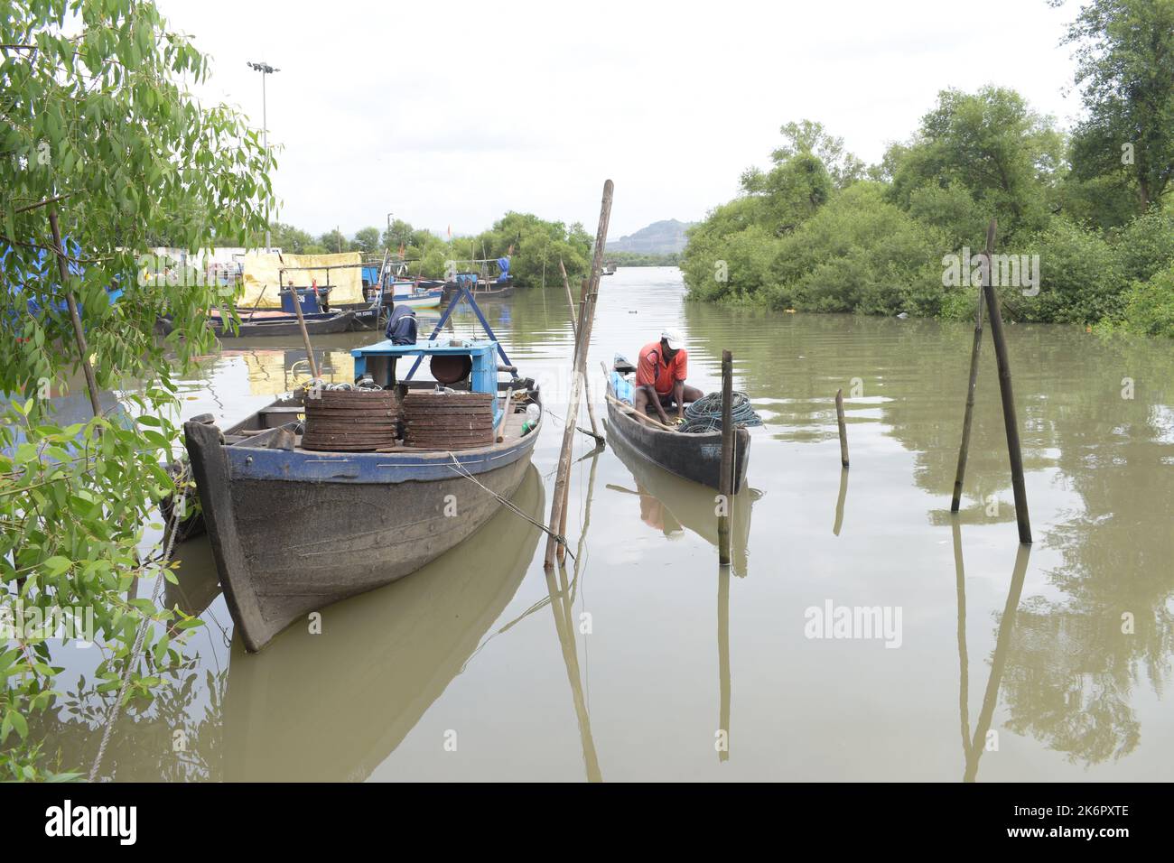Man working to restore his boat hi-res stock photography and images - Alamy