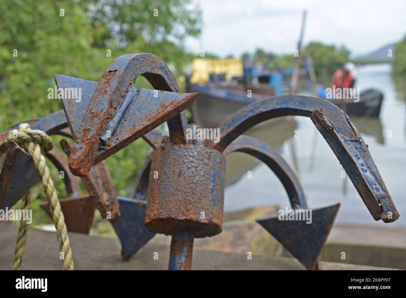 Rusty Anchors and Maritime Equipment on a Wooden Dock at Daytime Stock ...