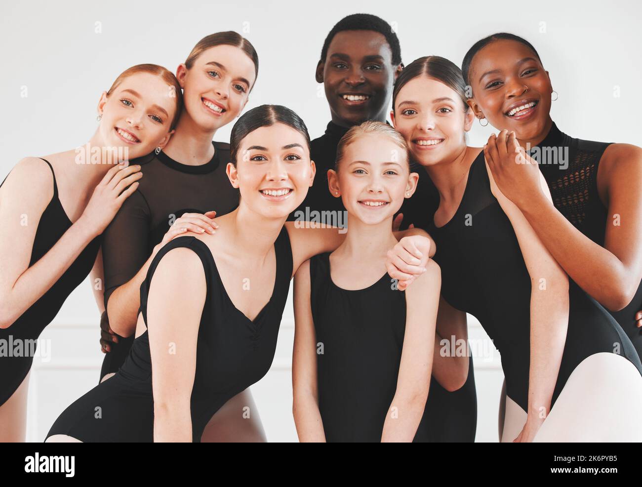 Were passionate about ballet. a group of ballet dancers standing ...