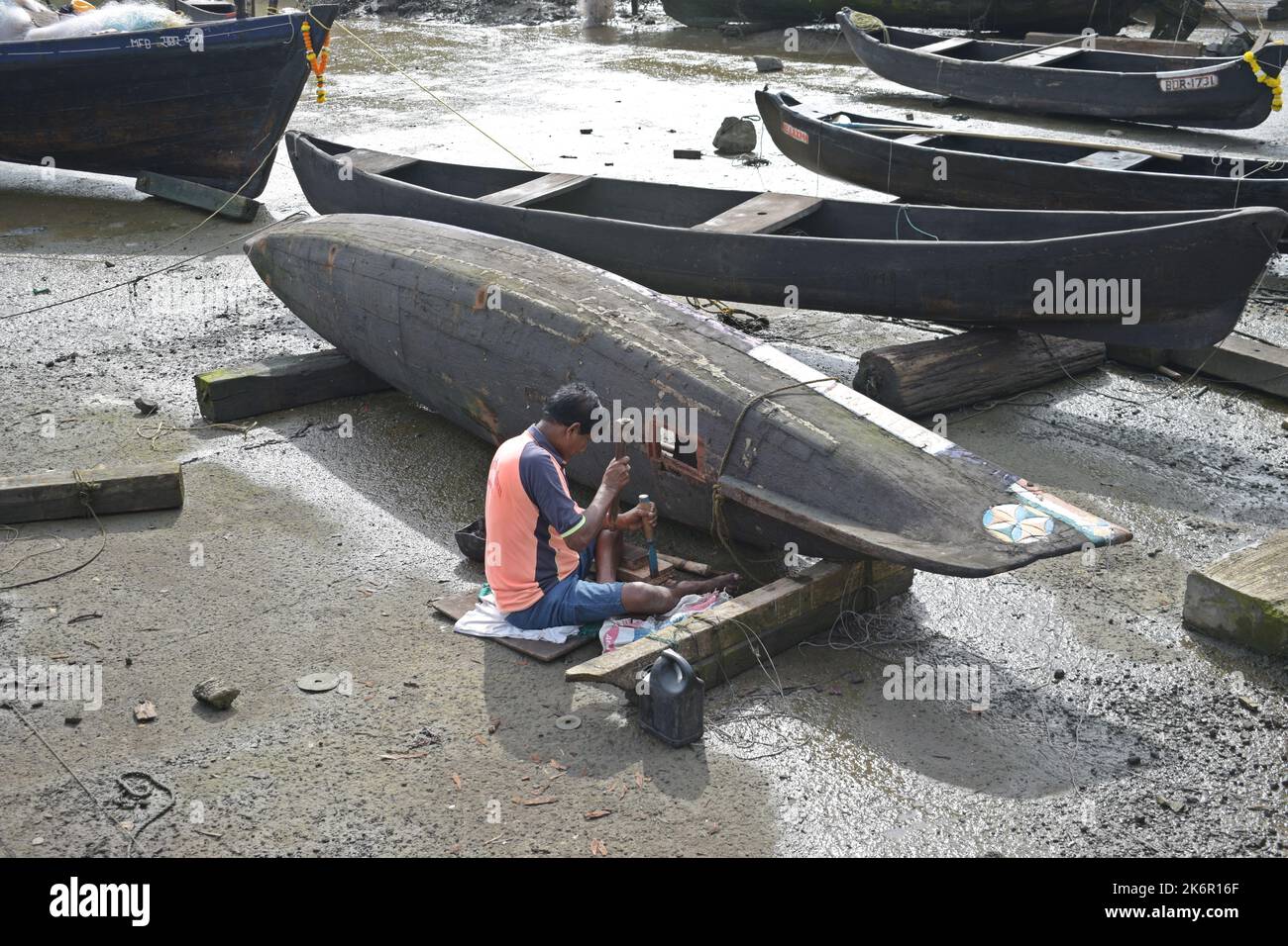 fisherman working on boat Stock Photo - Alamy