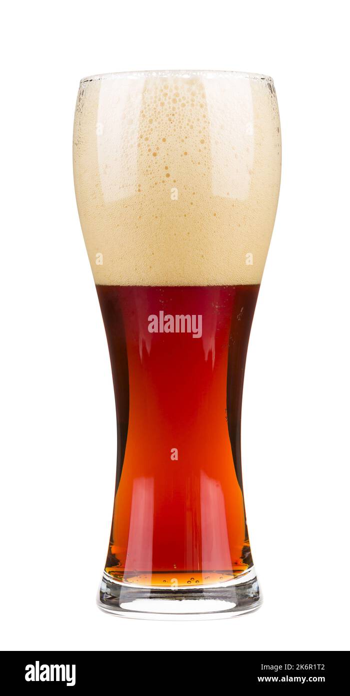 Red beer with bubbles foam in a glass, isolated on white background ...