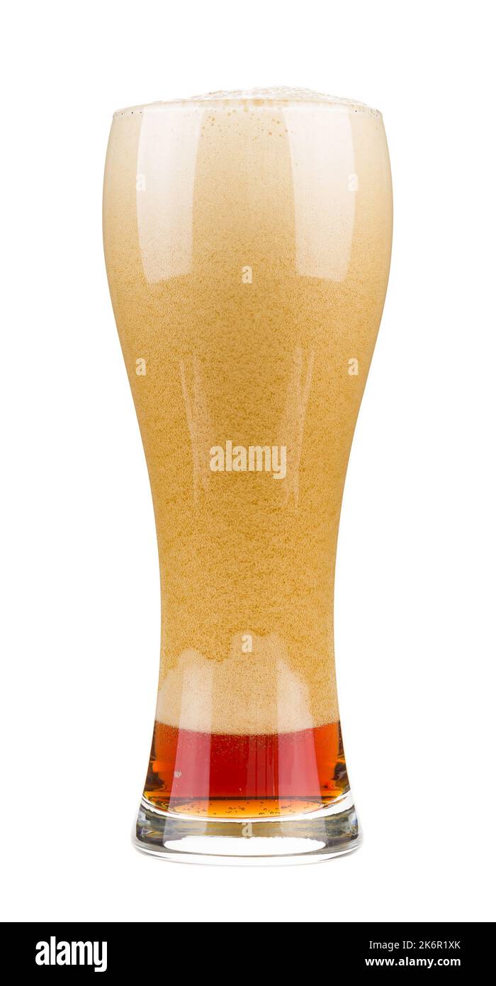 Red beer with bubbles foam in a glass, isolated on white background ...