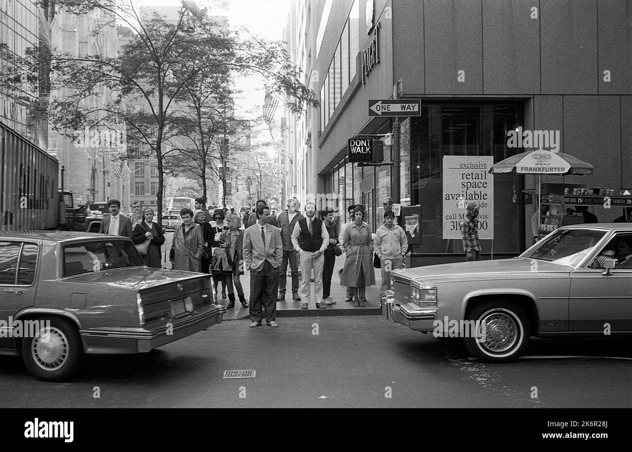 Cars and passerby in a downtown street, New York City, USA Stock Photo ...