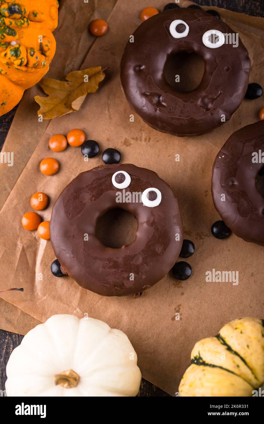 Halloween festive donuts with eyes Stock Photo - Alamy