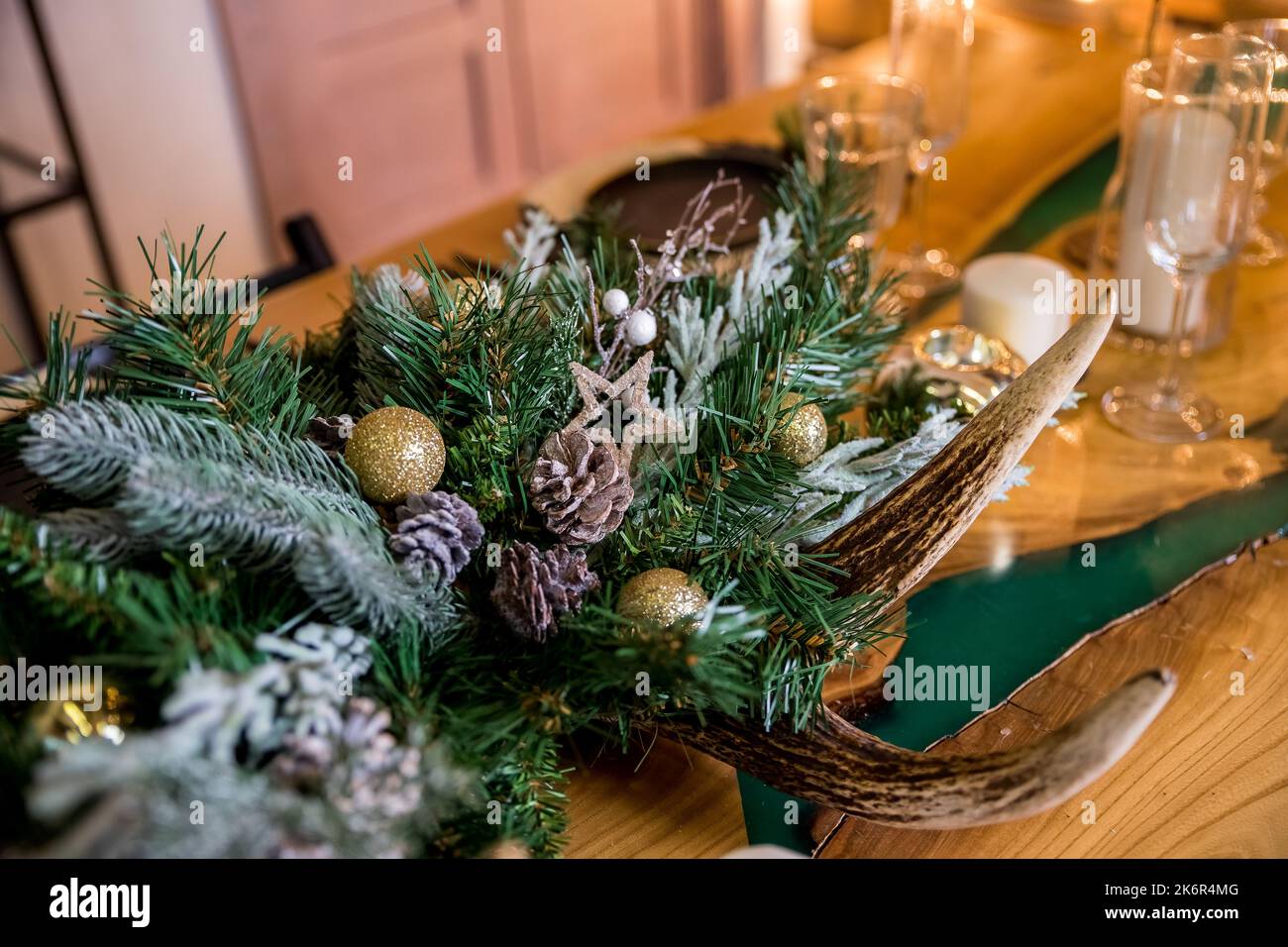 A large wooden table served for Christmas dinner in country house. new ...