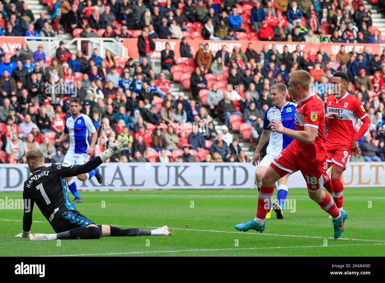 Duncan Watmore #18 of Middlesbrough takes a shot and scores a goal to ...