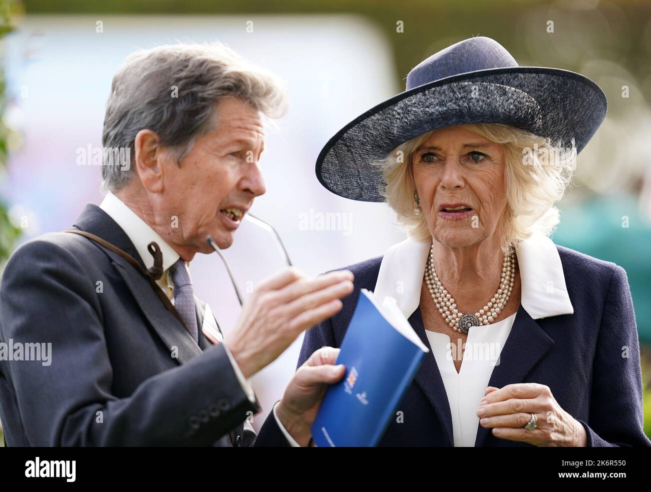 The Queen Consort with racing manager John Warren during the QIPCO ...