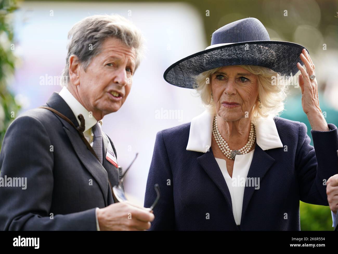 The Queen Consort with racing manager John Warren during the QIPCO ...