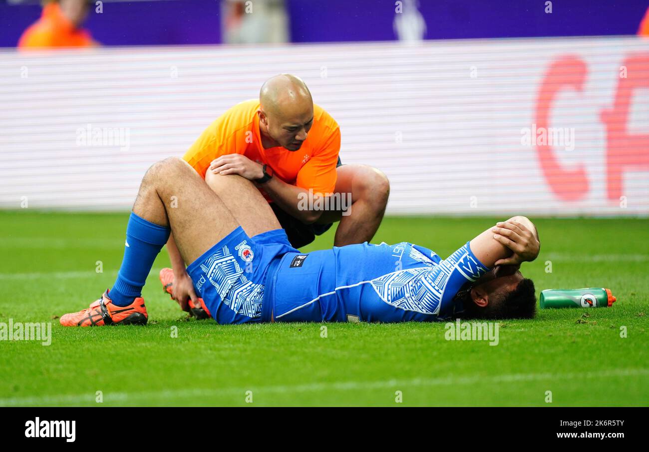 Samoa's Tyrone May receives medical attention during the Rugby League ...