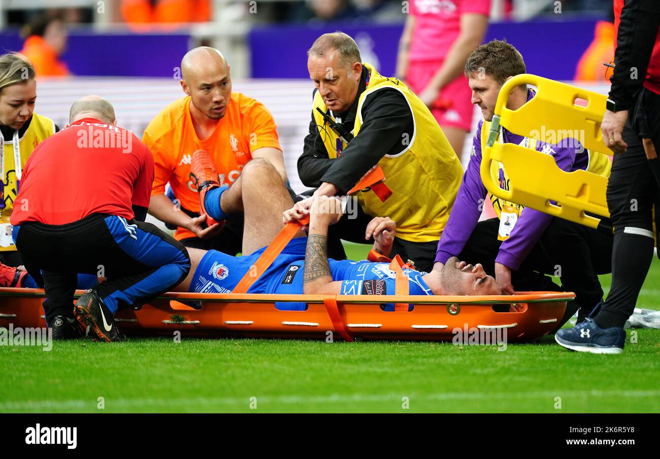 Samoa's Tyrone May is taken off the pitch by stretcher during the Rugby ...