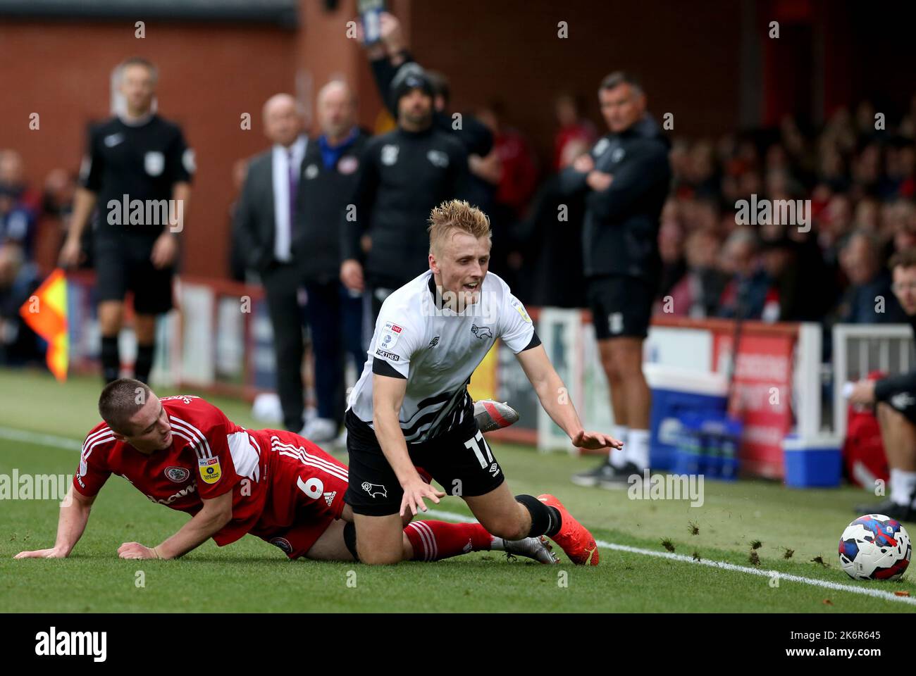 Accrington Stanley's Liam Coyle (left) and Derby County's Louie Sibley ...