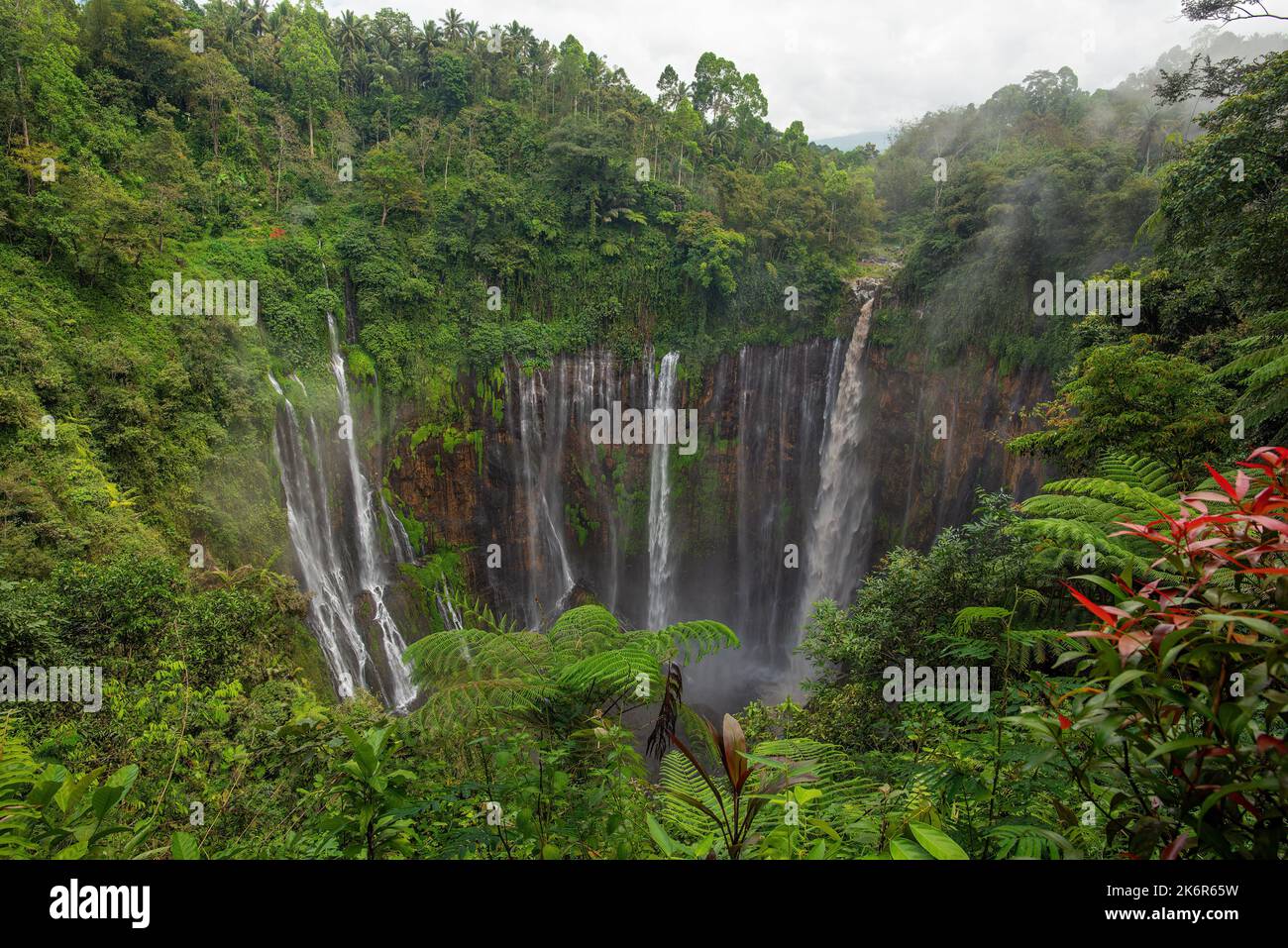 Tumpak Sewu or Coban Sewu is a tiered waterfall in East Java Indonesia ...