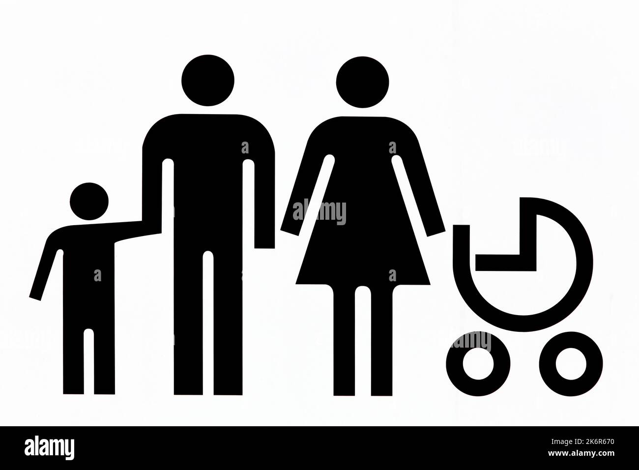 Family sign pictogram on a wall Stock Photo - Alamy