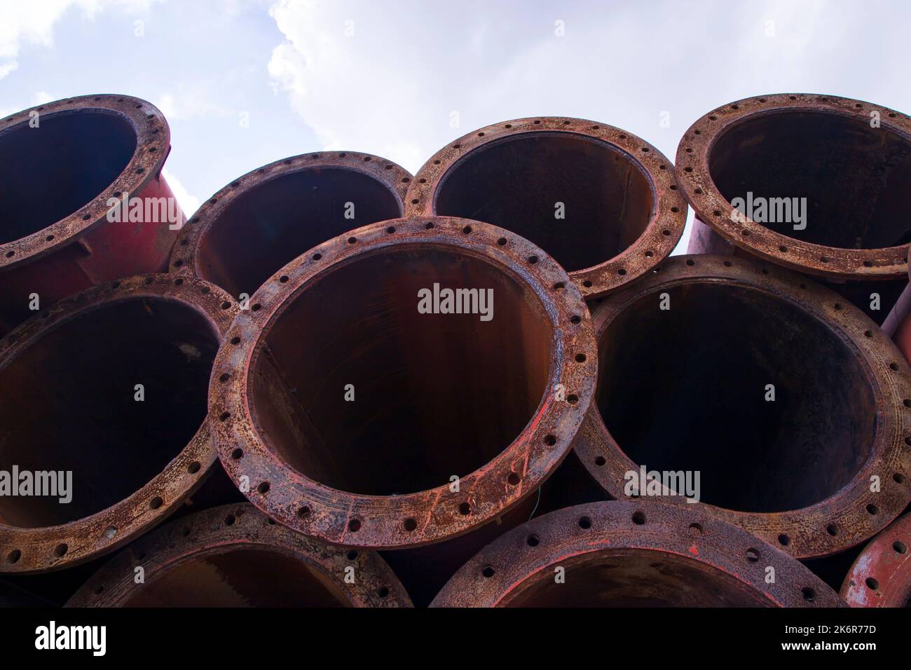 A texture industrial background of Rusty iron pipes stack Stock Photo ...