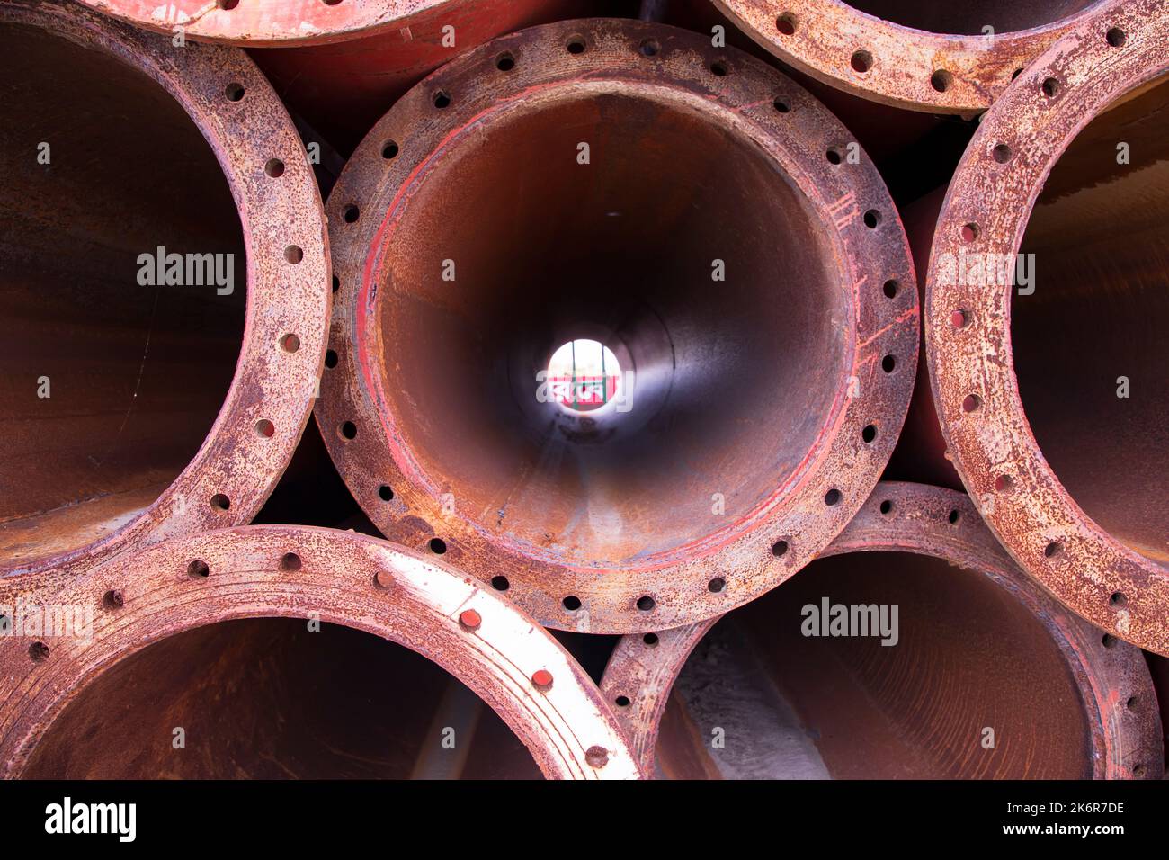 A texture industrial background of Rusty iron pipes stack Stock Photo ...