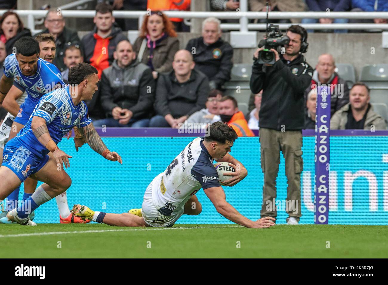 Herbie Farnworth of England goes over for a tryduring the Rugby League World Cup 2021 match ...
