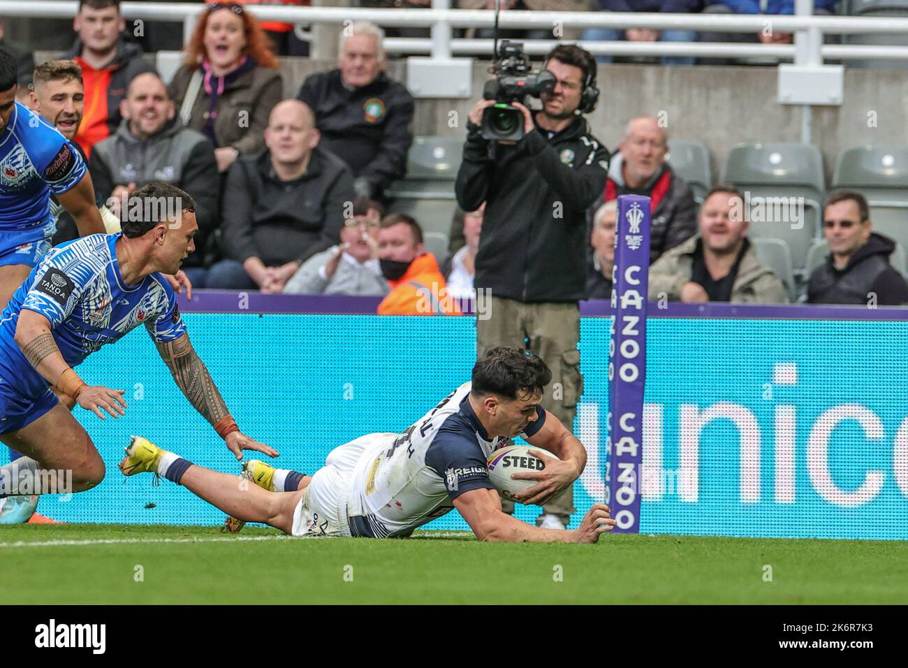 Herbie Farnworth of England goes over for a tryduring the Rugby League World Cup 2021 match ...