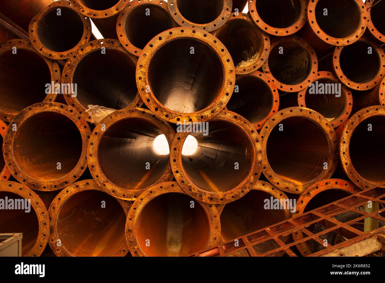 A texture industrial background of Rusty iron pipes stack Stock Photo ...