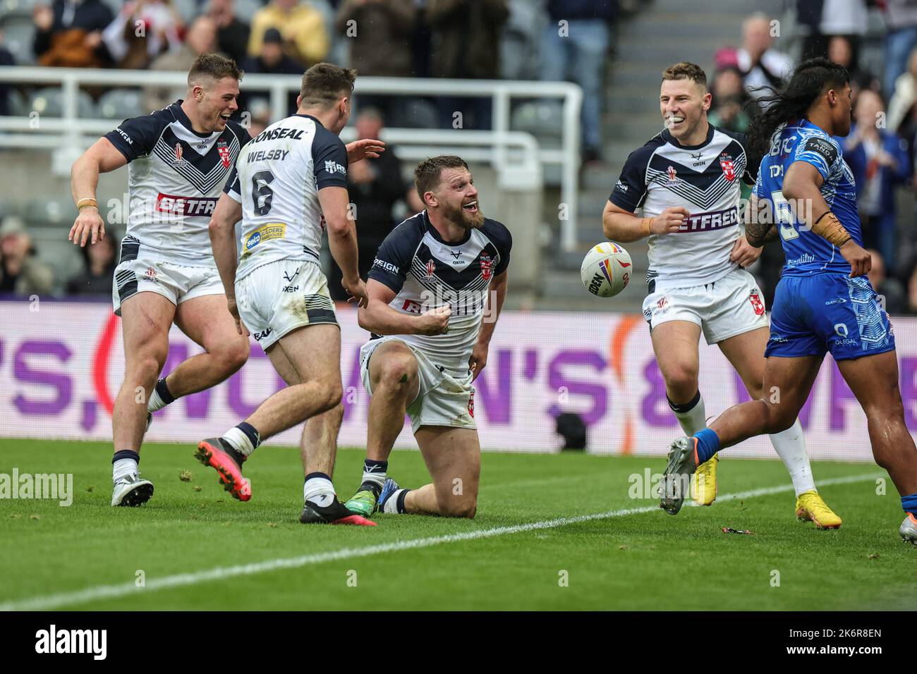Elliott Whitehead of England celebrates his try during the Rugby League ...