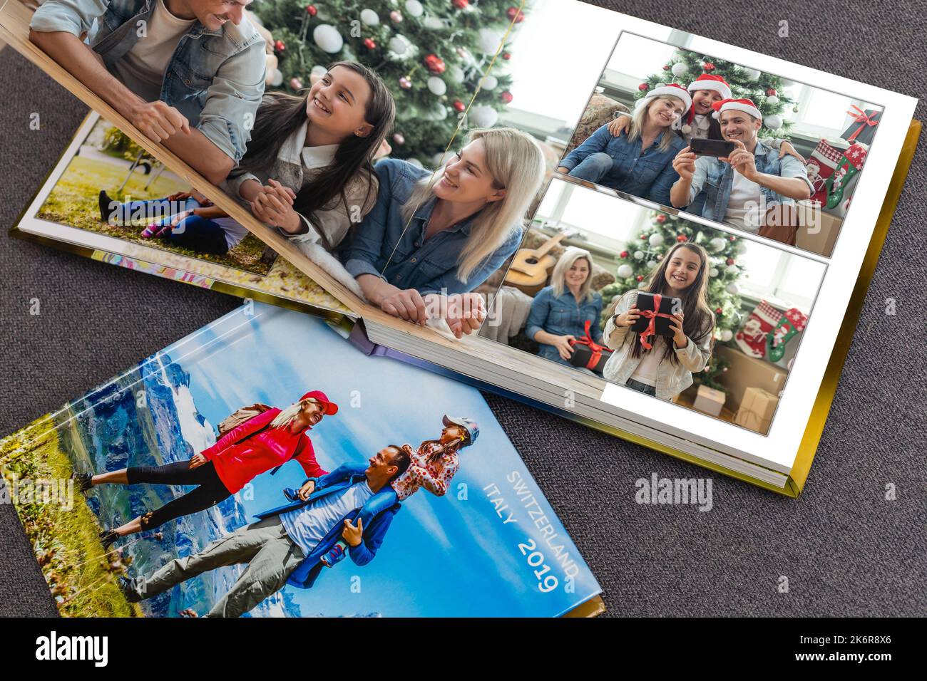 christmas and young family in retro photo book Stock Photo - Alamy