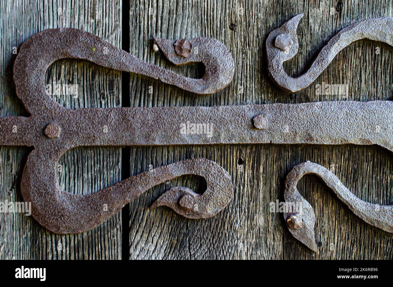 Rural wooden door with a metal hook minimalism, color, geometry, lines ...