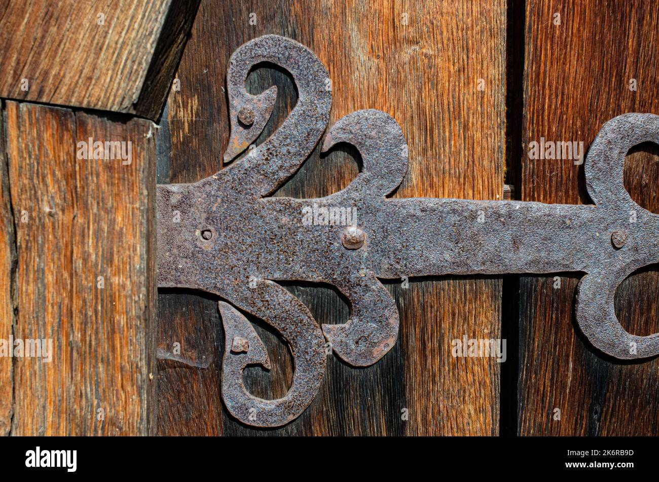 Rural wooden door with a metal hook minimalism, color, geometry, lines ...