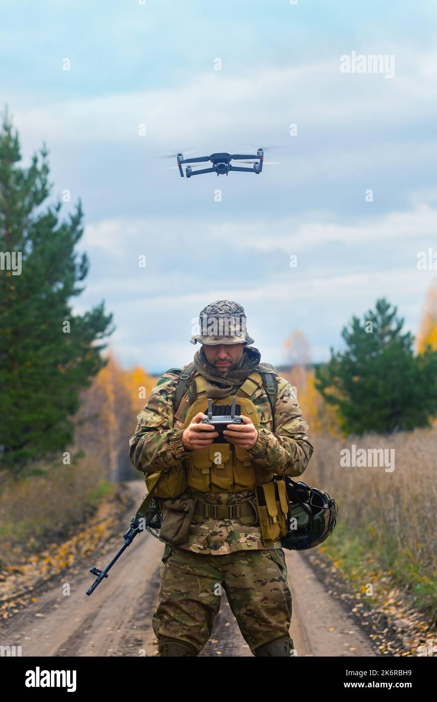 The mercenary launches a reconnaissance drone. Modern technological ...