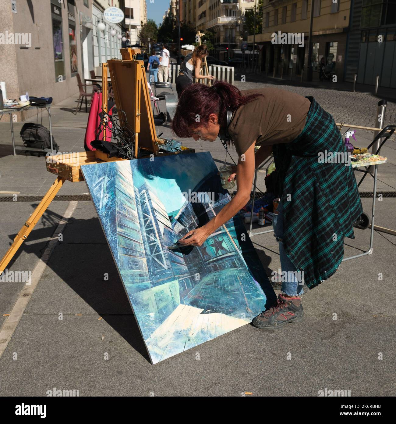 Madrid, Spain. 15th Oct, 2022. A participant paints a picture during ...