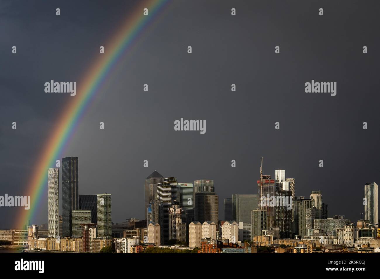 London, UK. 15th October, 2022. UK Weather: A massive rainbow breaks ...
